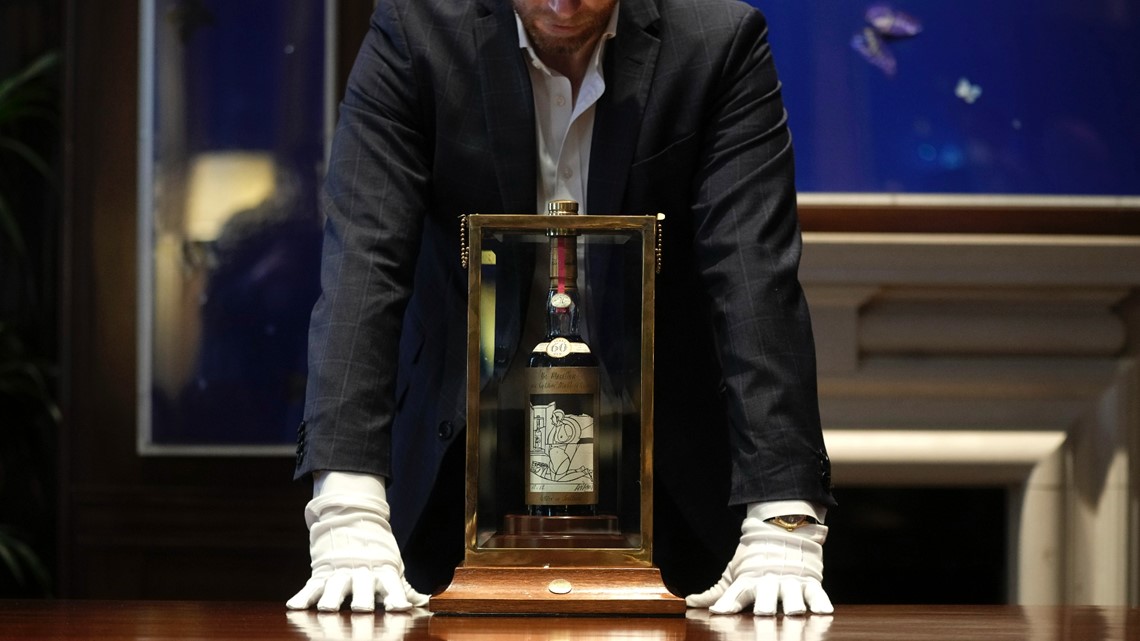 Bottle of Scotch whisky sells for record price at London auction ...