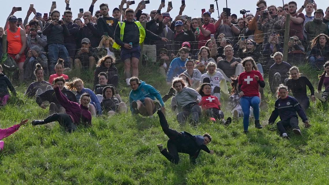 American man wins chaotic UK race chasing cheese down a hill | wusa9.com