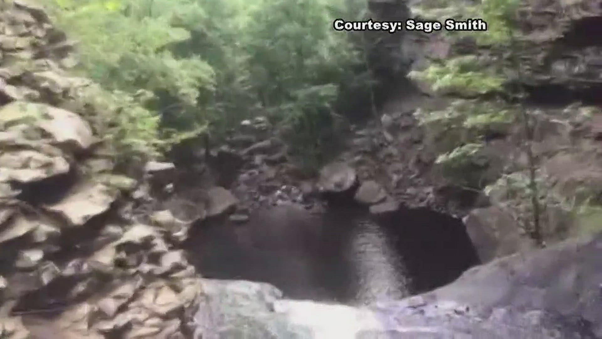 Teen survives a more than 90 foot fall off waterfall | wusa9.com