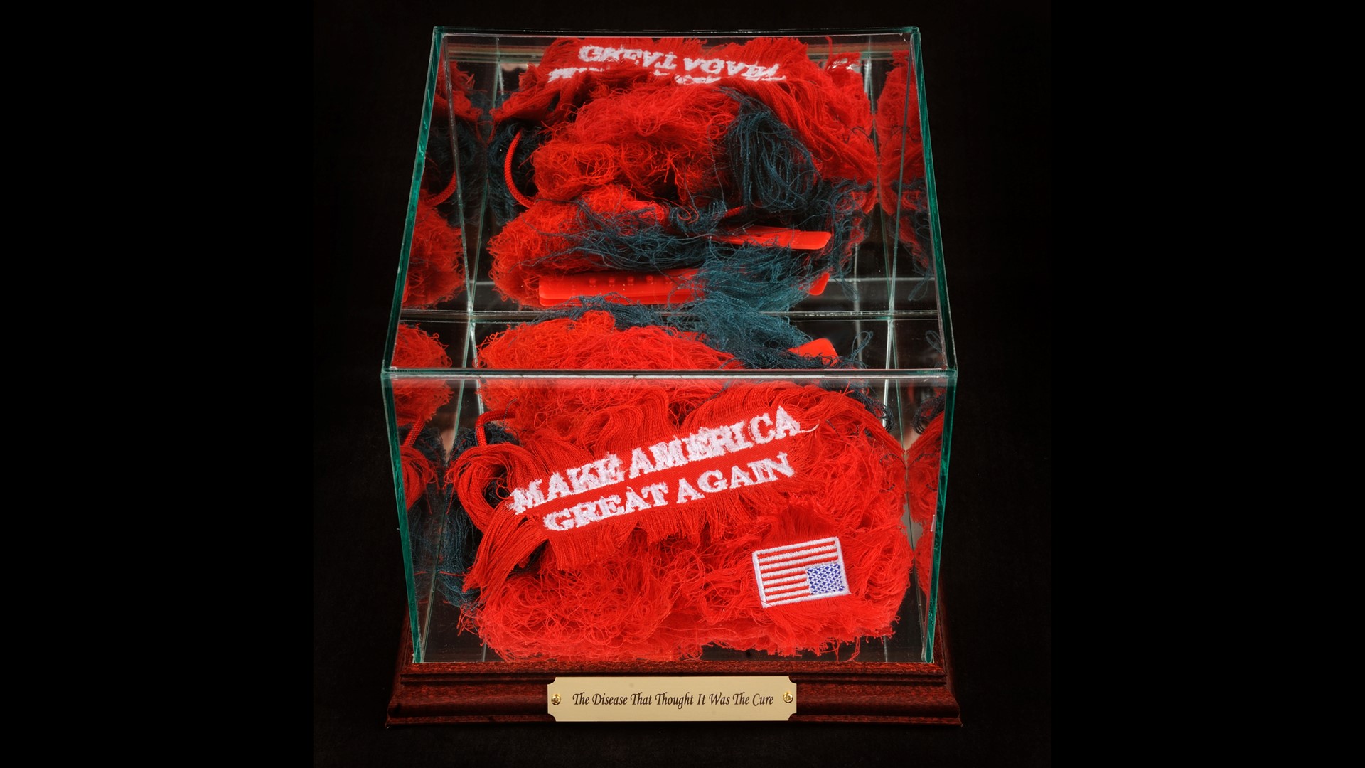 Artist who turns MAGA hats into symbols of hate speech banned from ...