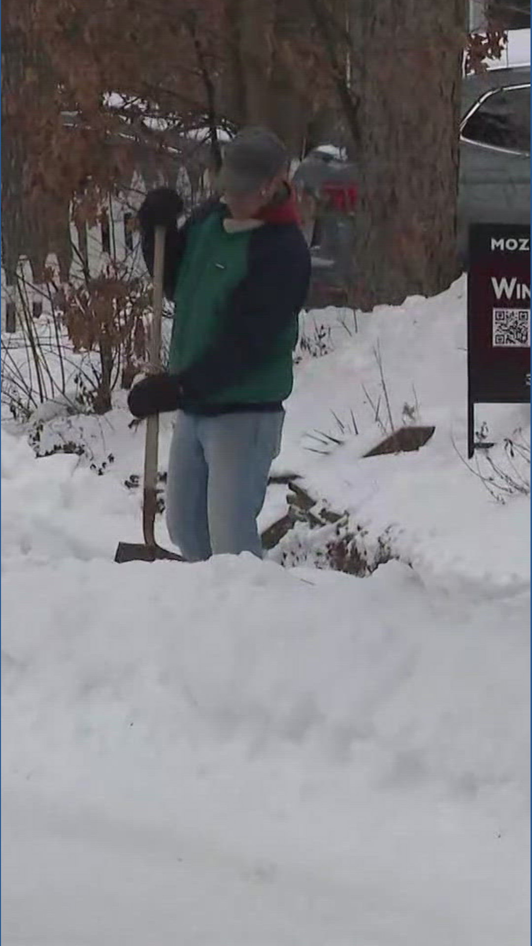 People use metal shovels to break up ice, snow after winter storm ...