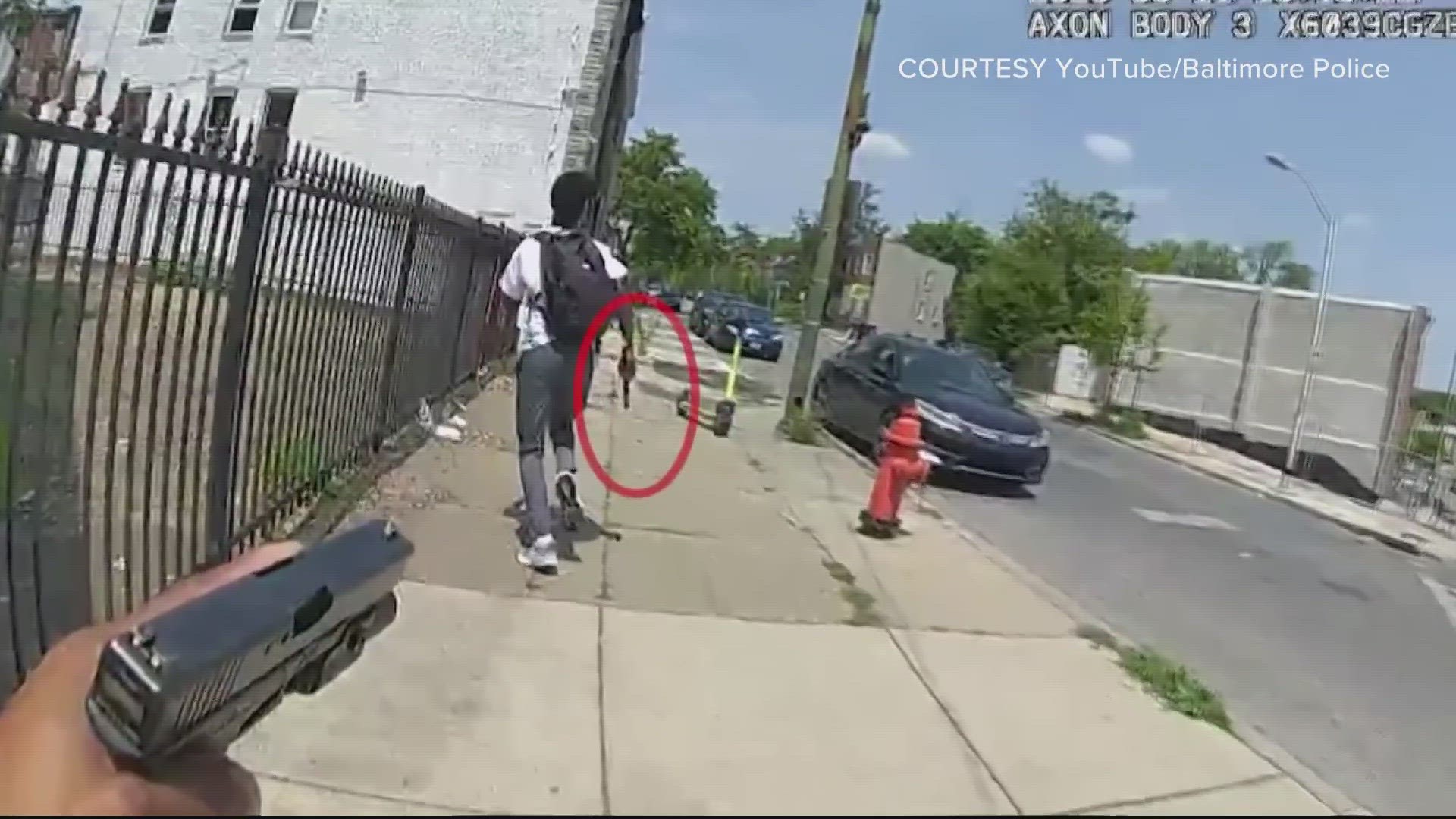 Video: Baltimore police officer shot armed teen from behind during foot ...
