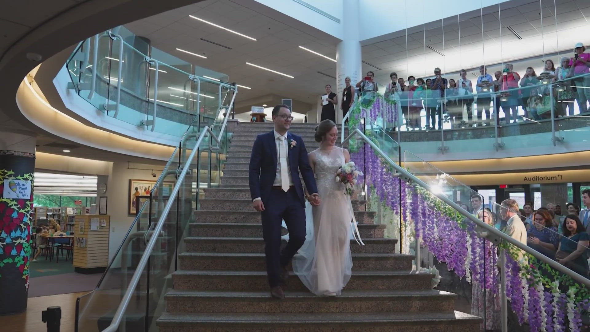 Couple gets married inside Arlington Public Library | wusa9.com