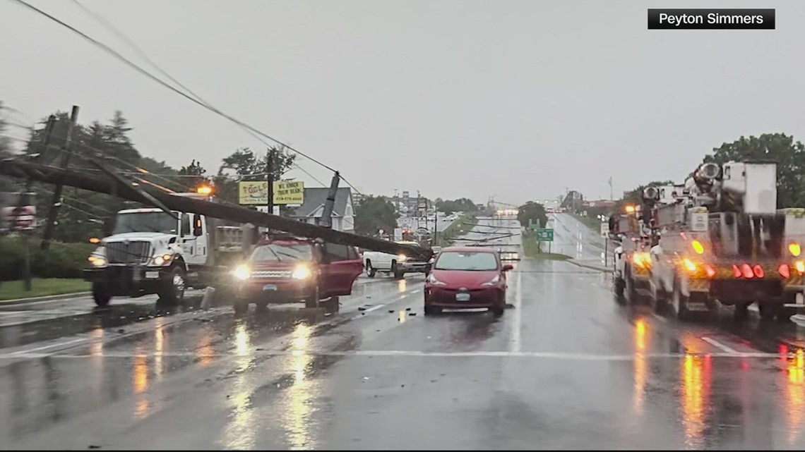 Drivers trapped in cars by downed power poles in Maryland | wusa9.com