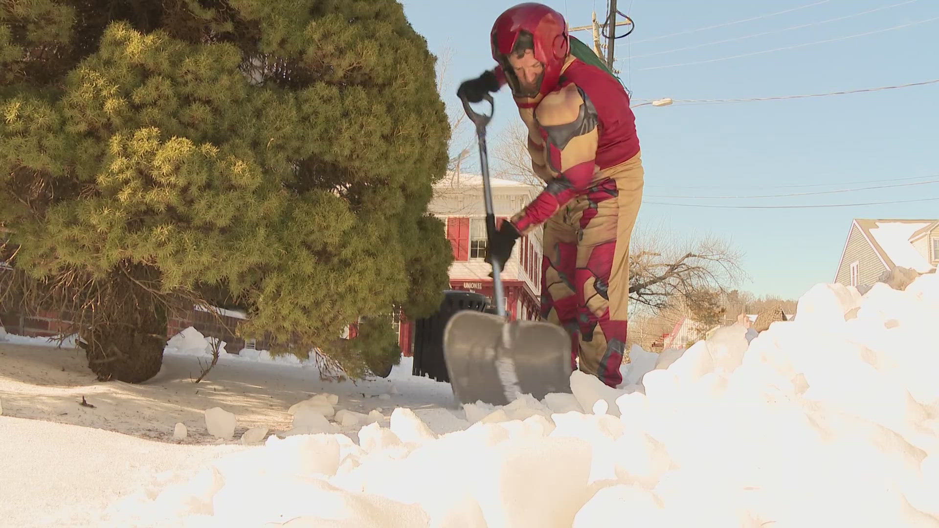 Mayor wears Iron Man suit while helping clear snow from sidewalk ...
