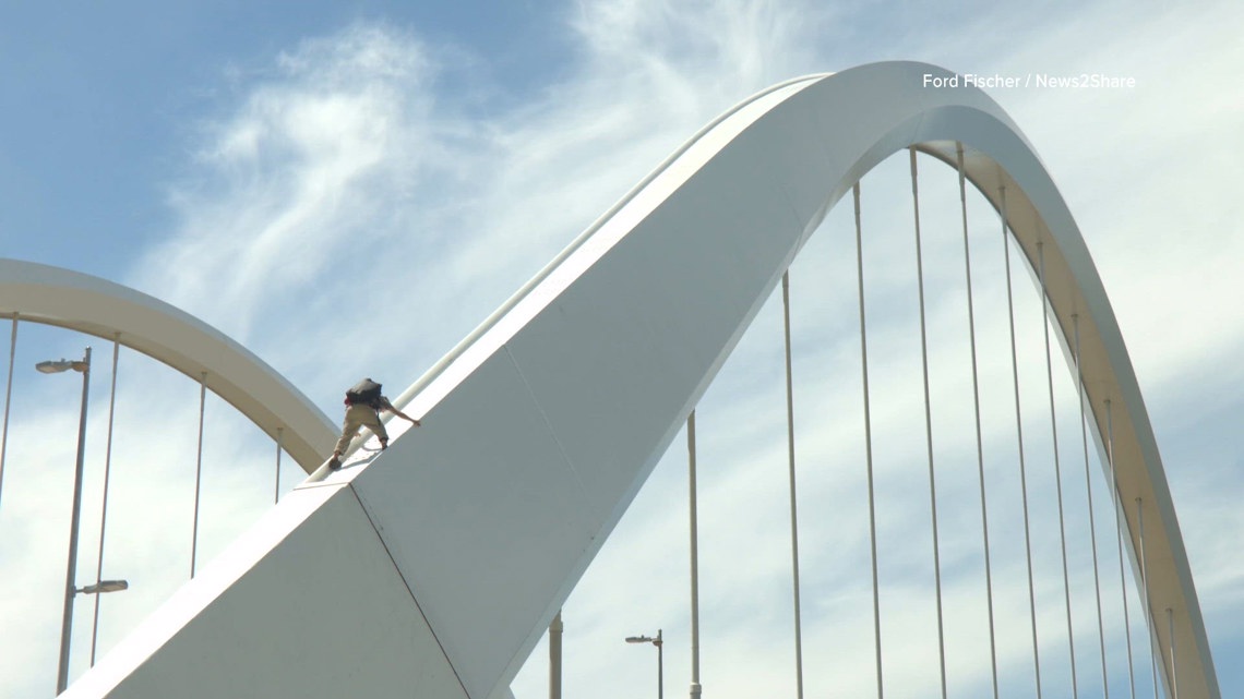 Protester remains on Frederick Douglass Bridge Tuesday | wusa9.com