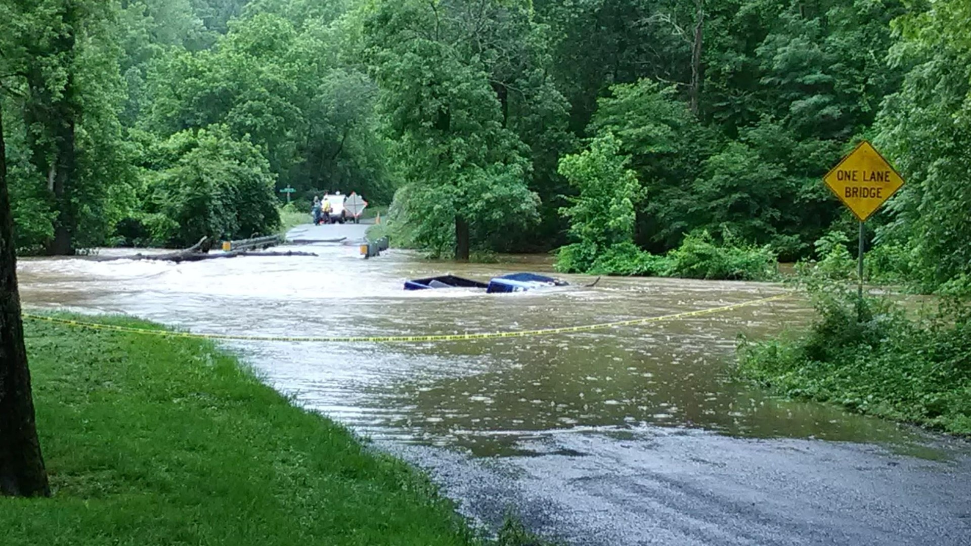Heavy rain causes flash flooding, topples trees onto roads and homes on ...