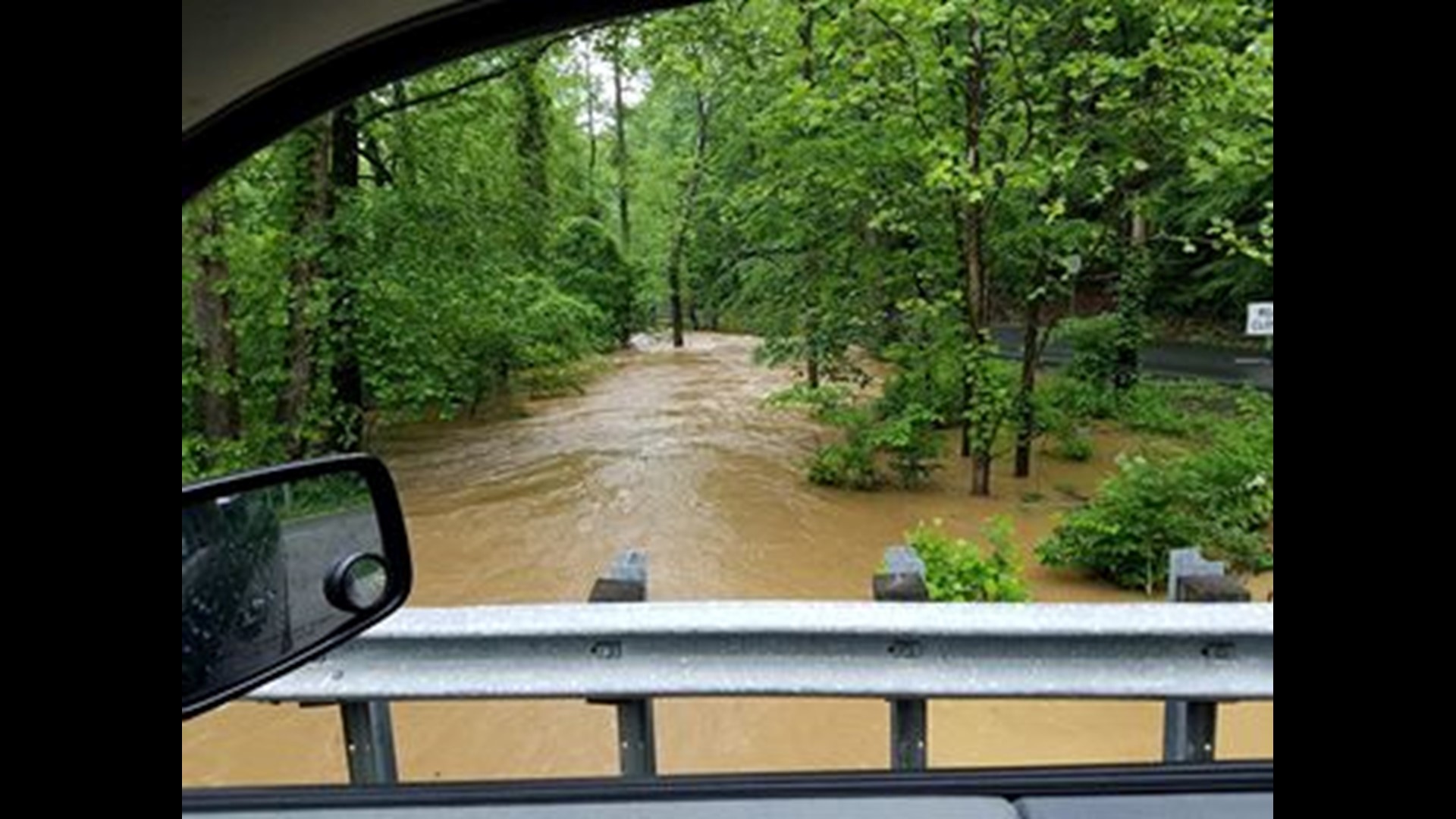 Heavy rain causes flash flooding, topples trees onto roads and homes on ...