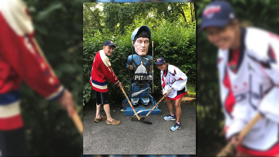 This couple has the biggest Caps bobblehead you've ever seen | wusa9.com