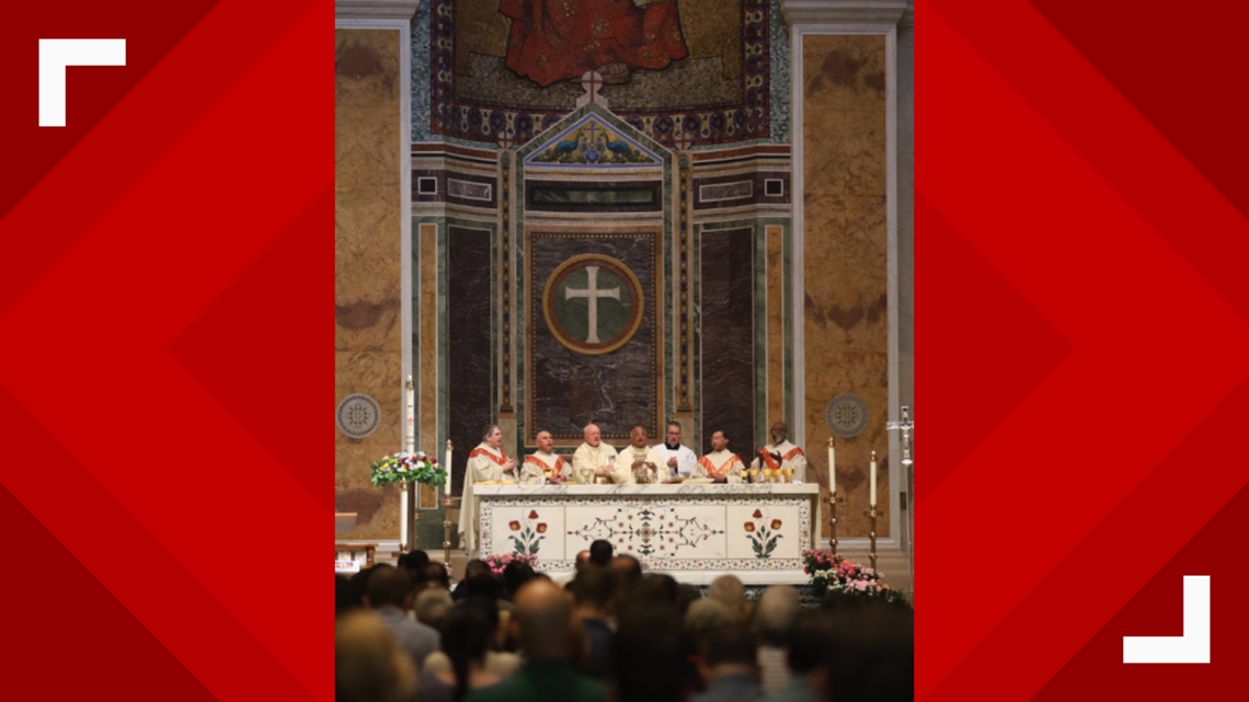 Archbishop Gregory opens cathedral doors for first Sunday Mass as ...