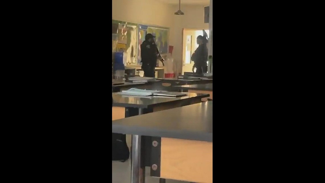 Police with guns and shields seen inside Wakefield High School in ...