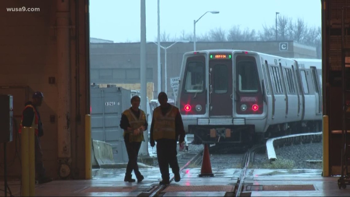 Metro sends power back into 3rd rail with work crew on tracks | wusa9.com