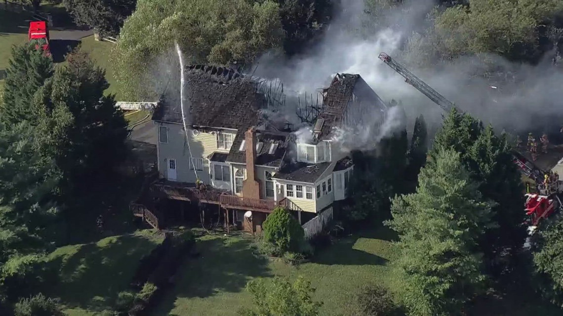 Firefighters battle house fire in Laytonsville | wusa9.com