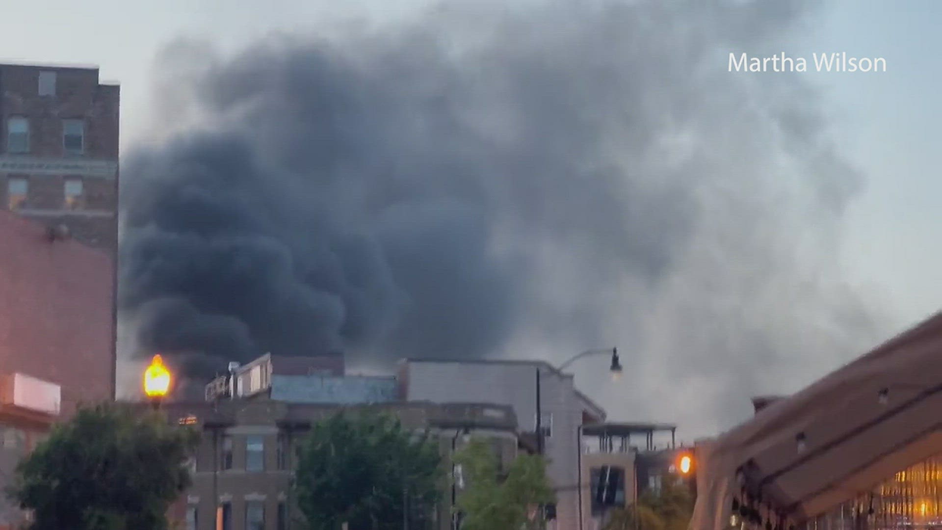 Firefighters battle fire on roof of apartment building in Adams Morgan ...
