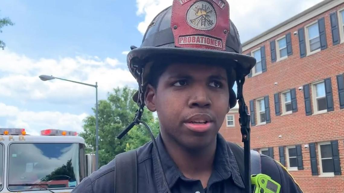 Rookie DC firefighter saves woman from fiery apartment | wusa9.com