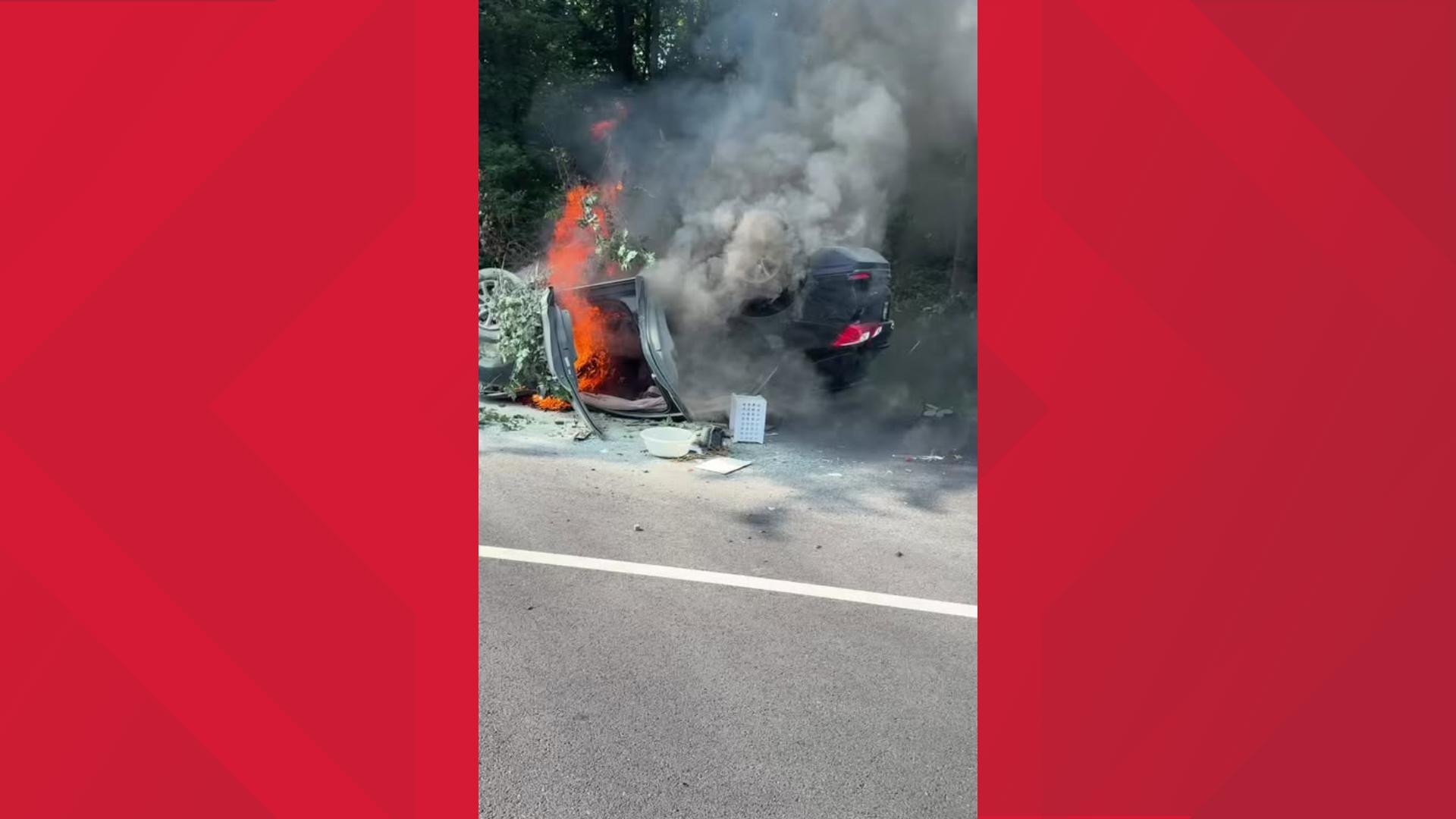 Rapper and former firefighter rescues driver from burning car | wusa9.com