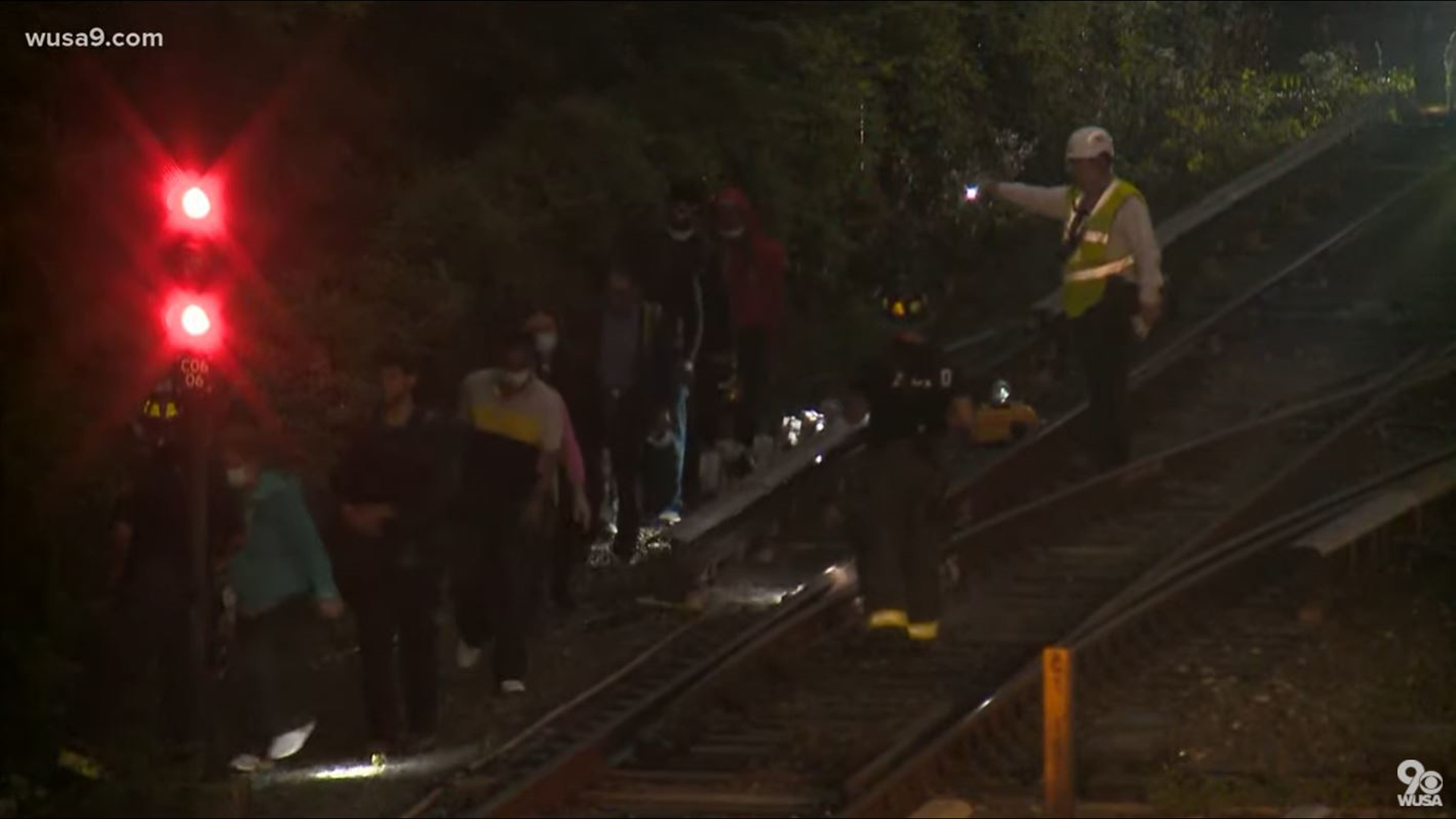 PHOTOS: 300-400 passengers evacuated from derailed Metro train | wusa9.com