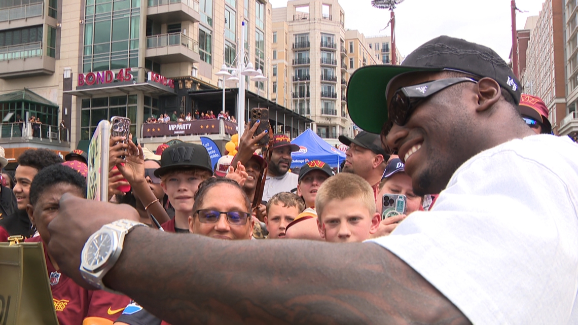 Commanders players greet fans during draft party at National Harbor ...