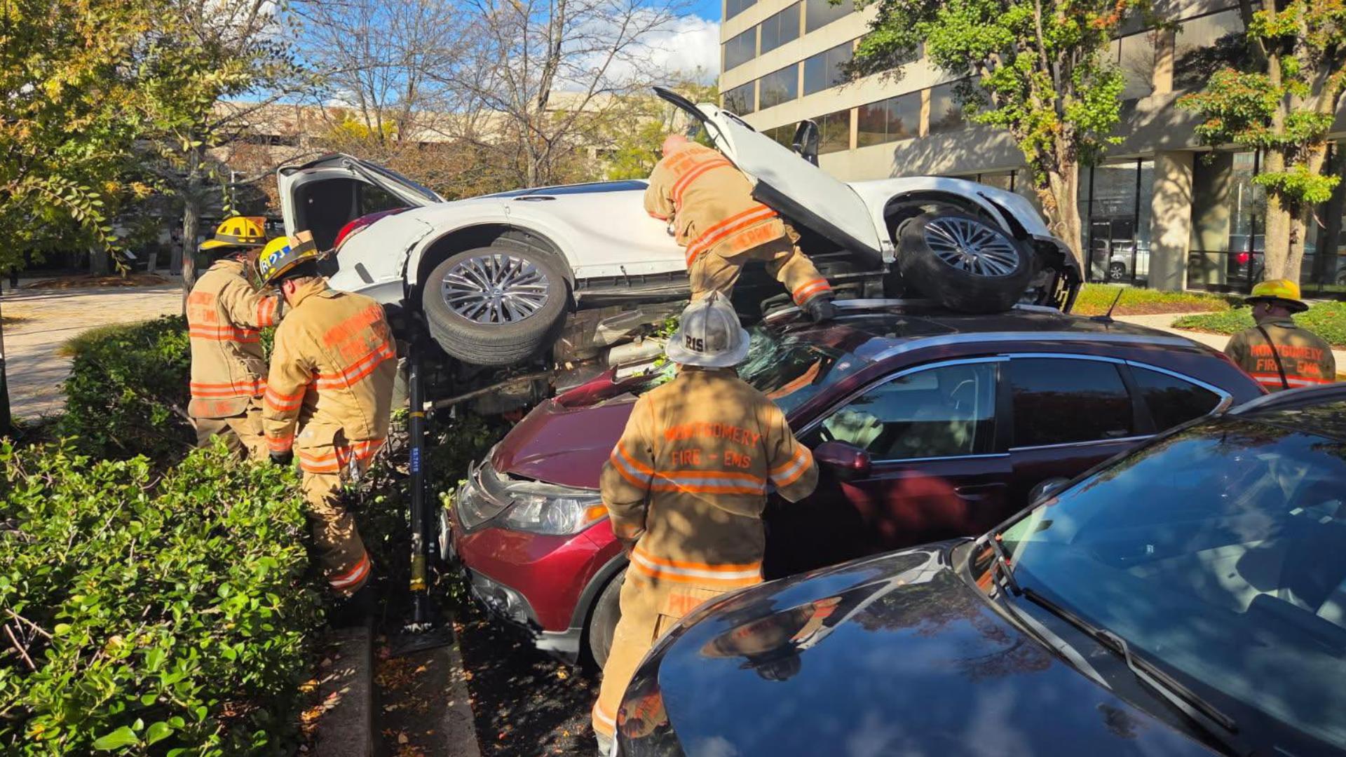 1 person transported after car becomes wedged in North Bethesda parking ...