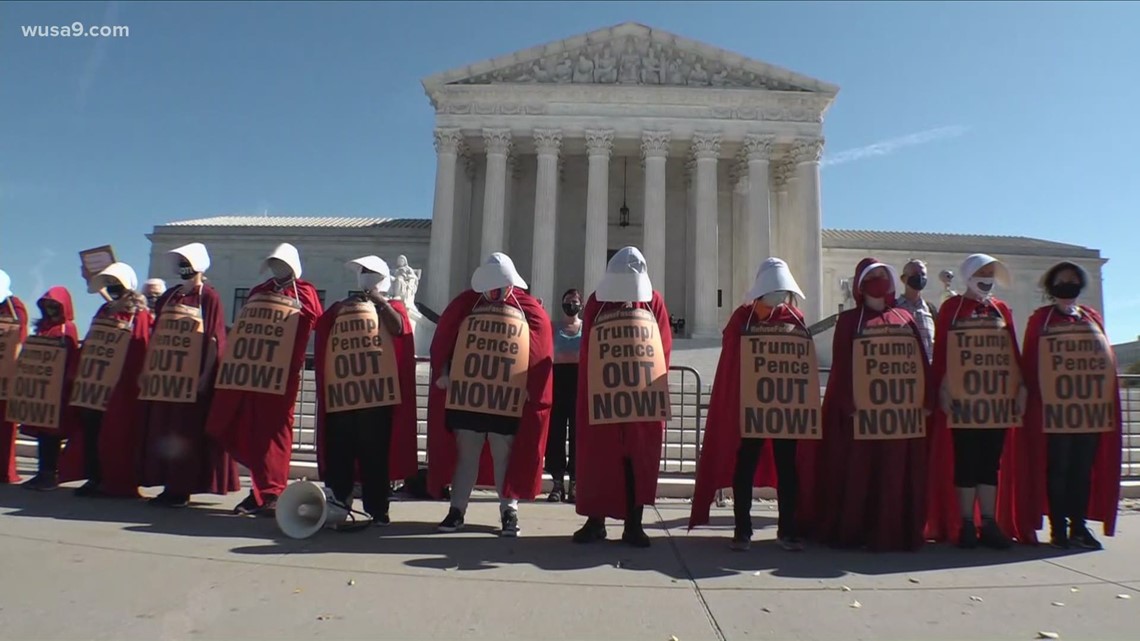 DC protesters dressed as 'Handmaids' rally on last day of SCOTUS ...