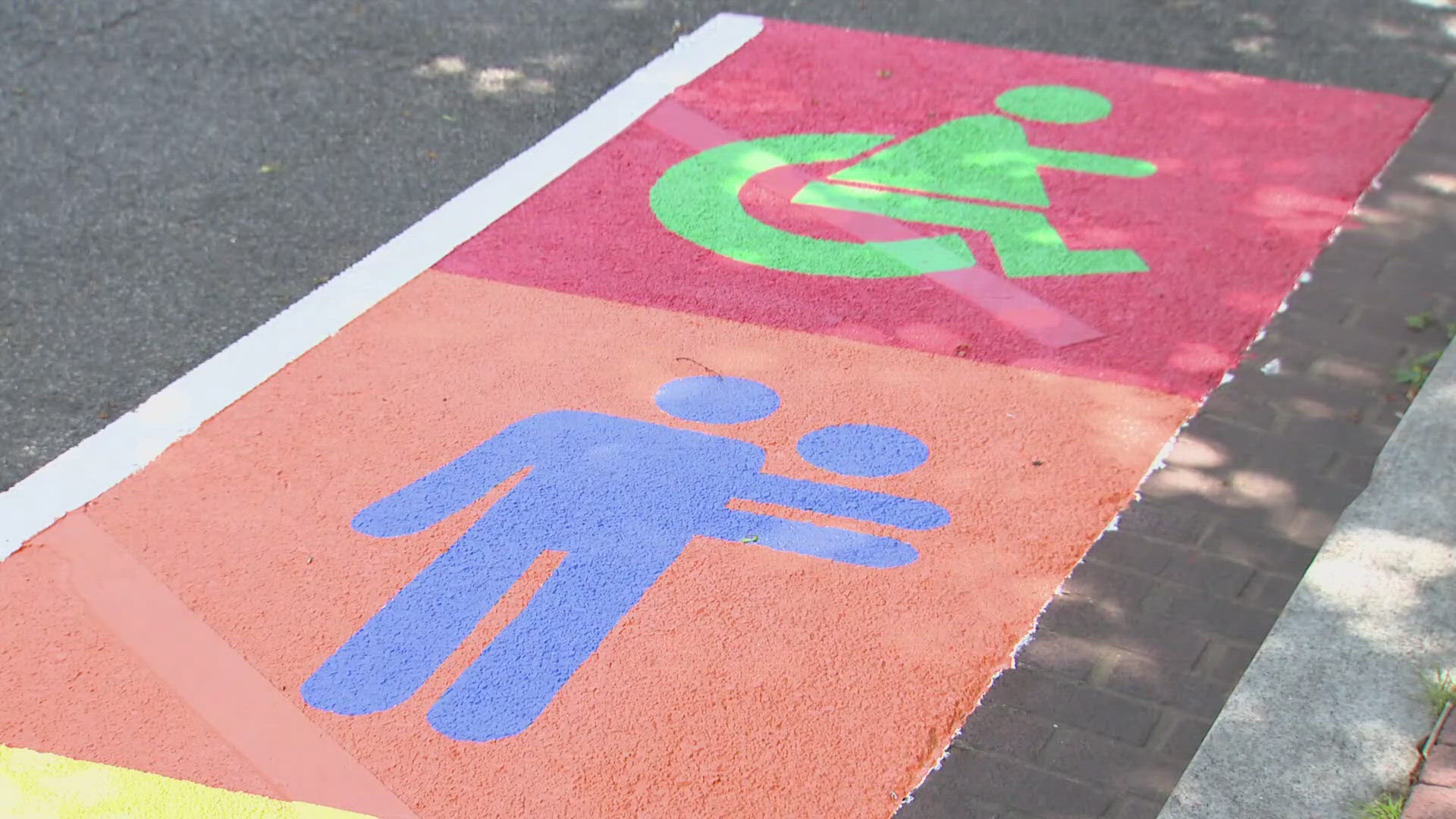 Artists paint Rainbow Road along 15th Street in DC | wusa9.com