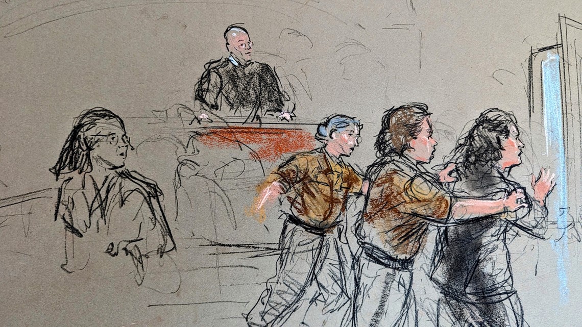 Mother convicted of murdering her daughters dragged from court | wusa9.com