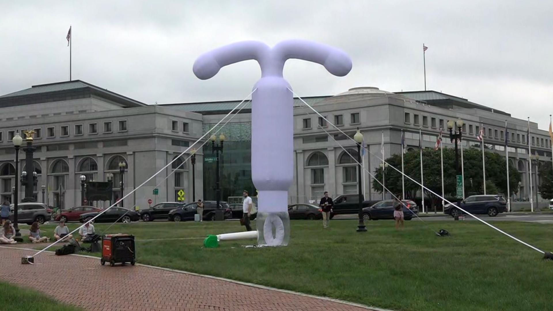 Giant inflatable IUD outside Union Station in DC | wusa9.com