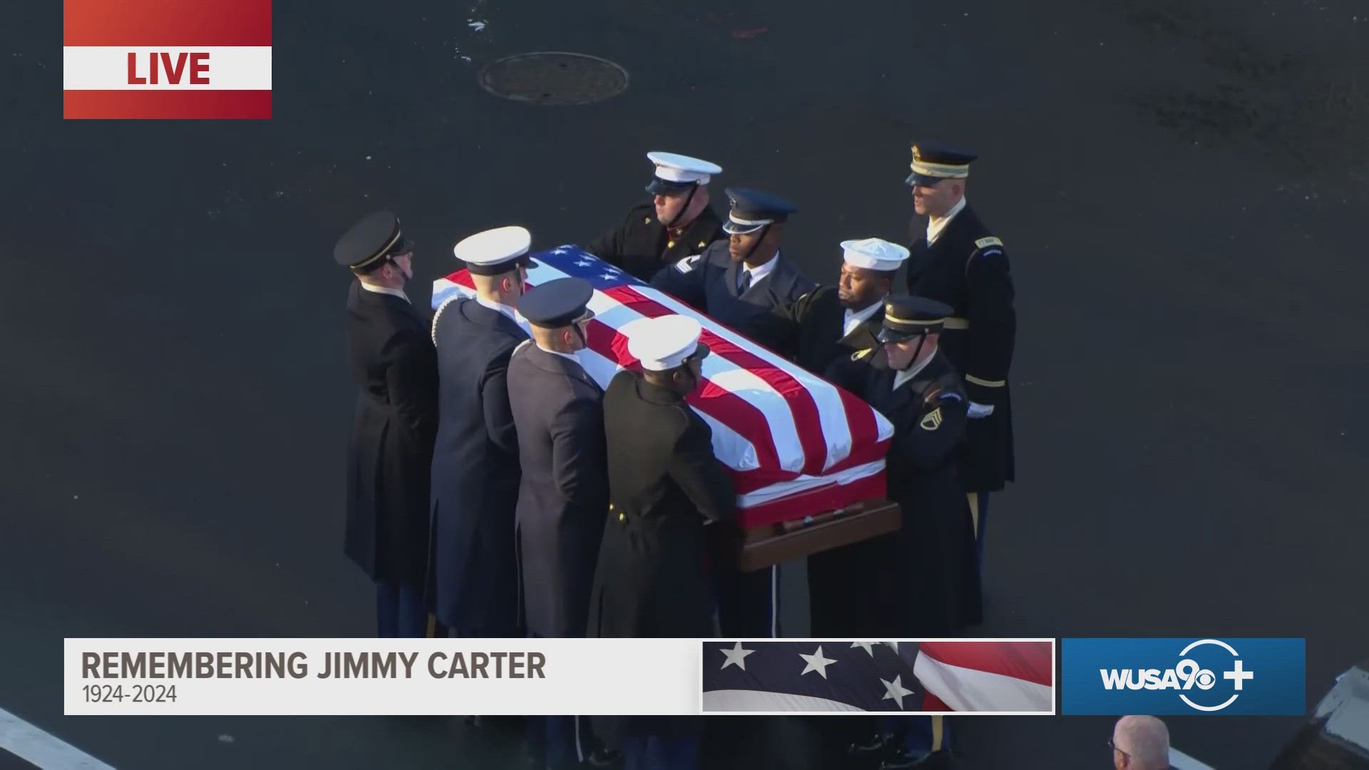Band plays "Hail to The Chief" as Carter's casket is transferred to ...