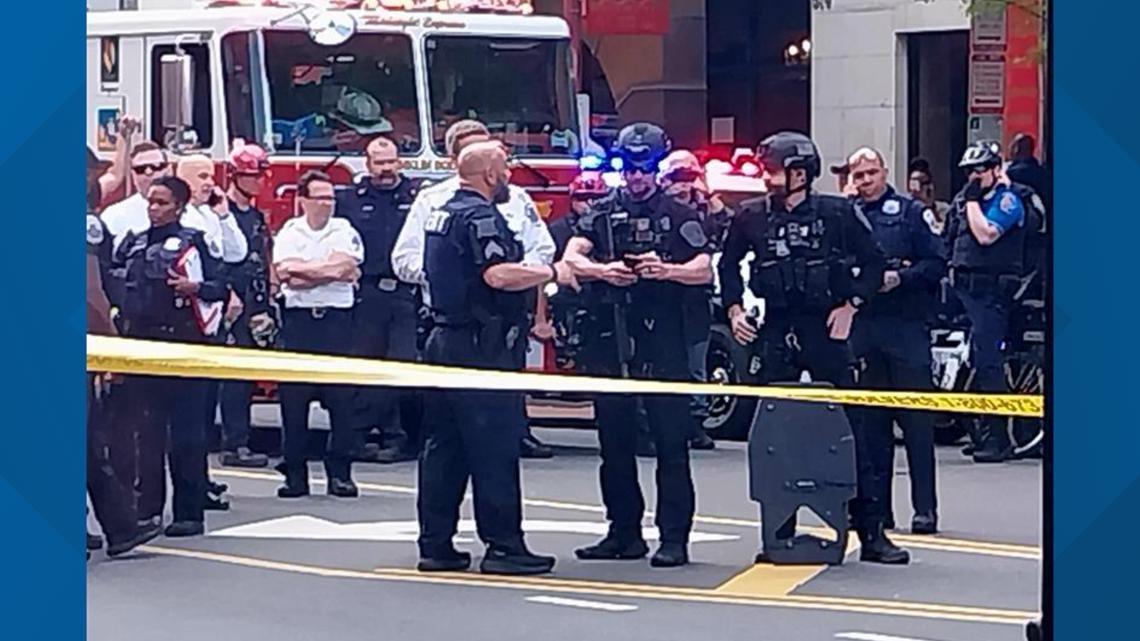 Man escapes arrest, climbs onto roof of Northwest DC building | wusa9.com