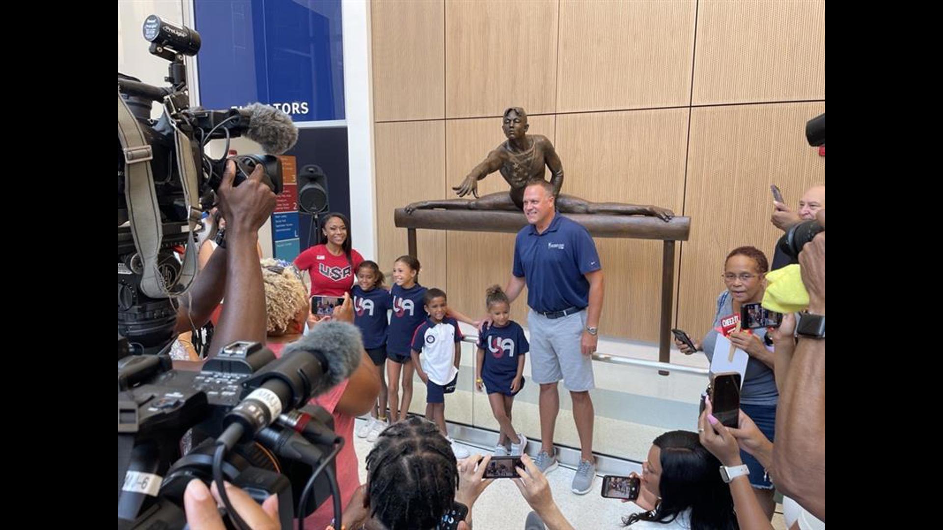 Olympic legend Dominique Dawes gets statue in Montgomery County | wusa9.com