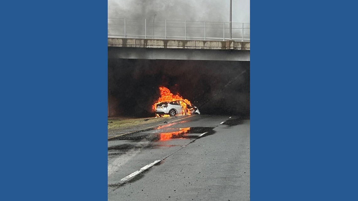 Tesla catches fire on Dulles Access Road | wusa9.com