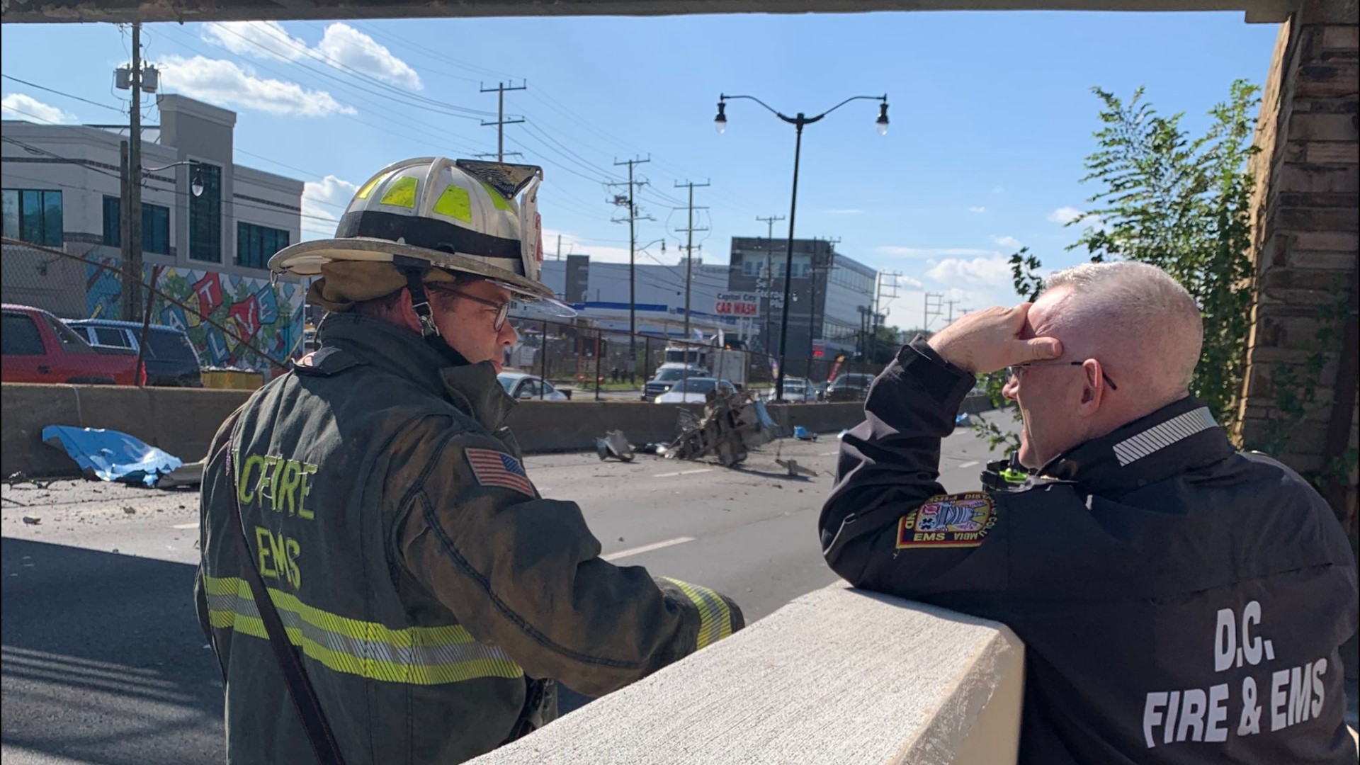 Firefighters evaluating pedestrian bridge on DC 295 after it was hit by ...