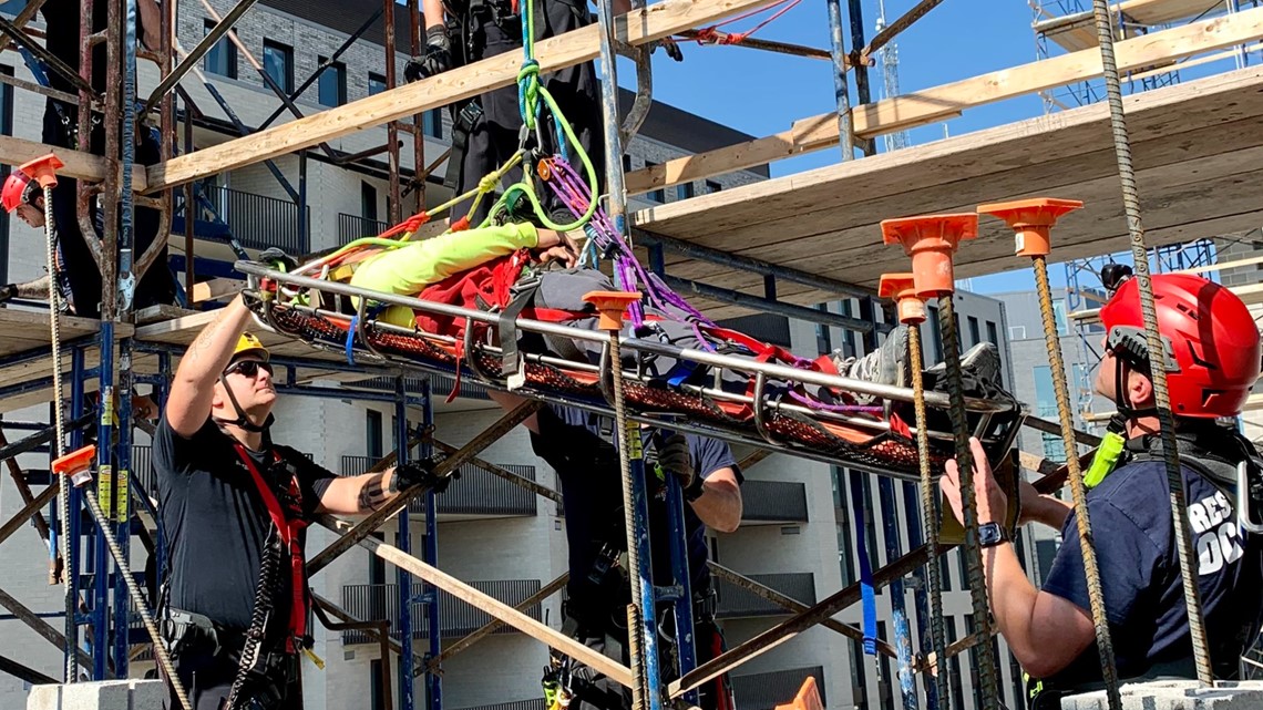 Worker rushed to hospital after falling from construction site | wusa9.com