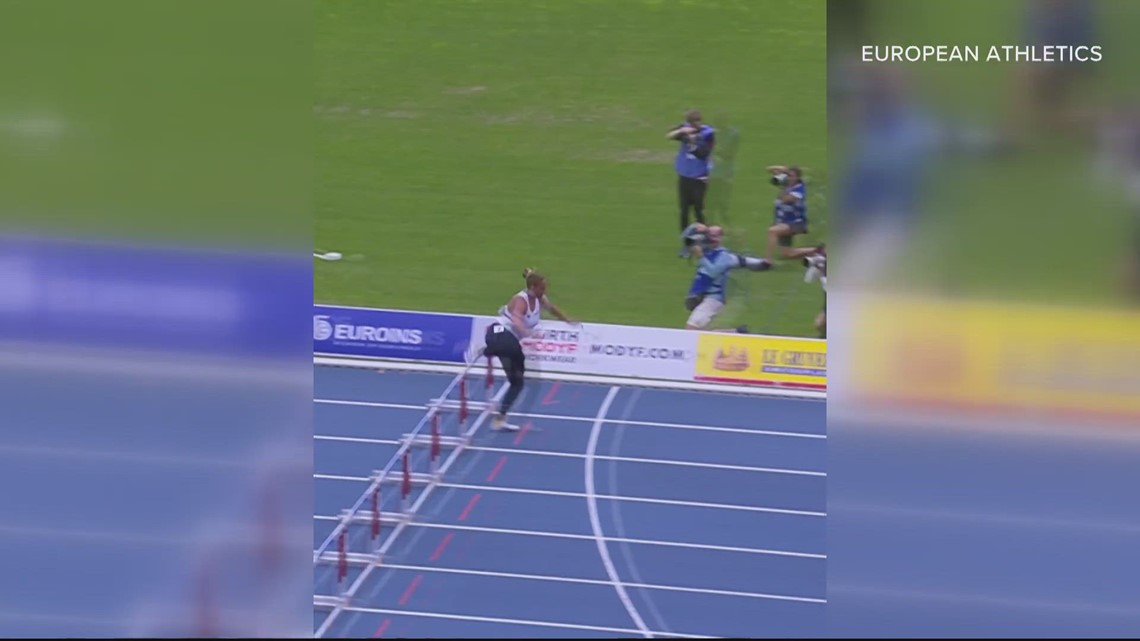 Belgian shot putter goes viral for running hurdles to save her team ...