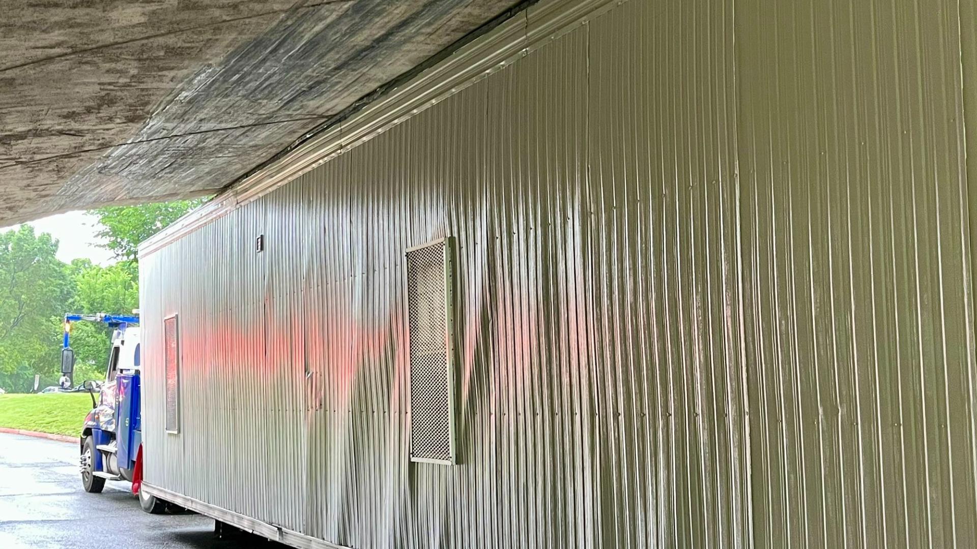 Tractor trailer stuck under DC bridge | wusa9.com