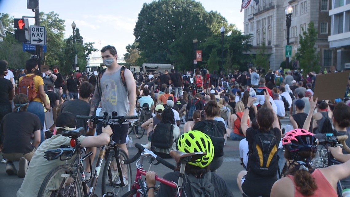 'People aren't standing for this' | DC protests brave 90°+ heat | wusa9.com