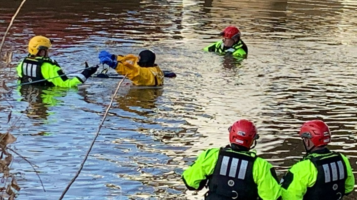 Divers rescue man trapped in car at the bottom of Anacostia River ...