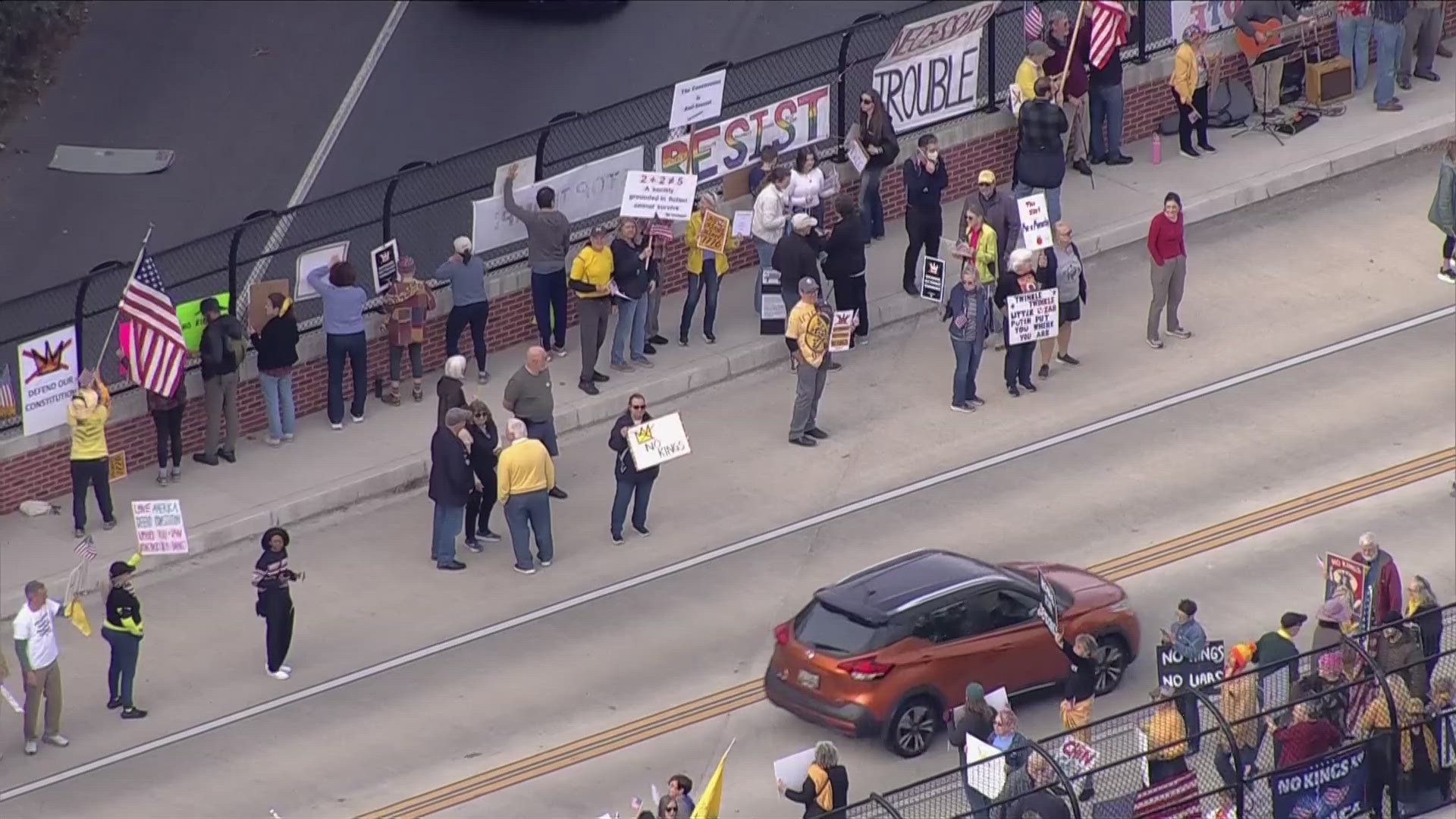 No Kings Protests: Protesters on freeway overpasses in Washington DC ...